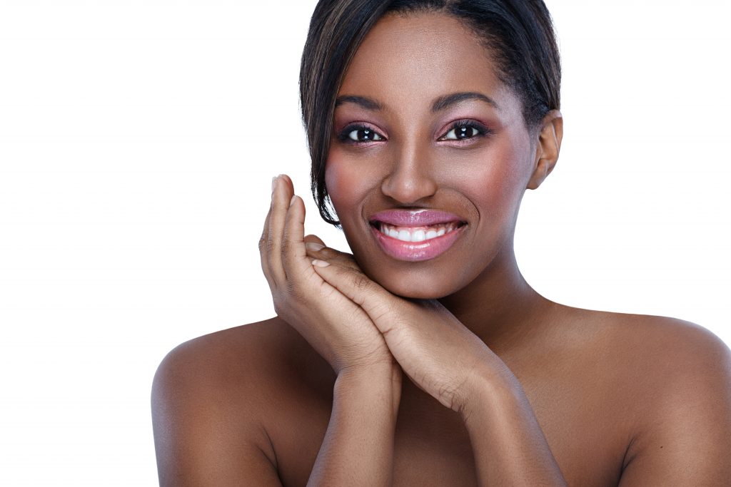 Facial Implants - Model smiling over successful cheek implants ...